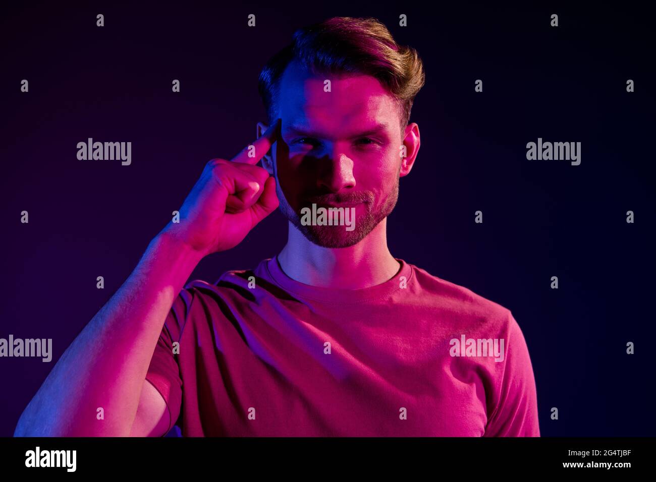 Portrait of attractive serious minded guy touching temple overthinking ...