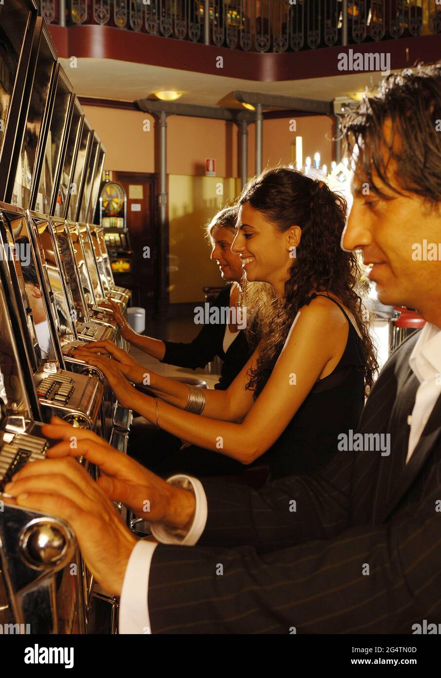 Gambler playing machines hi-res stock photography and images - Alamy