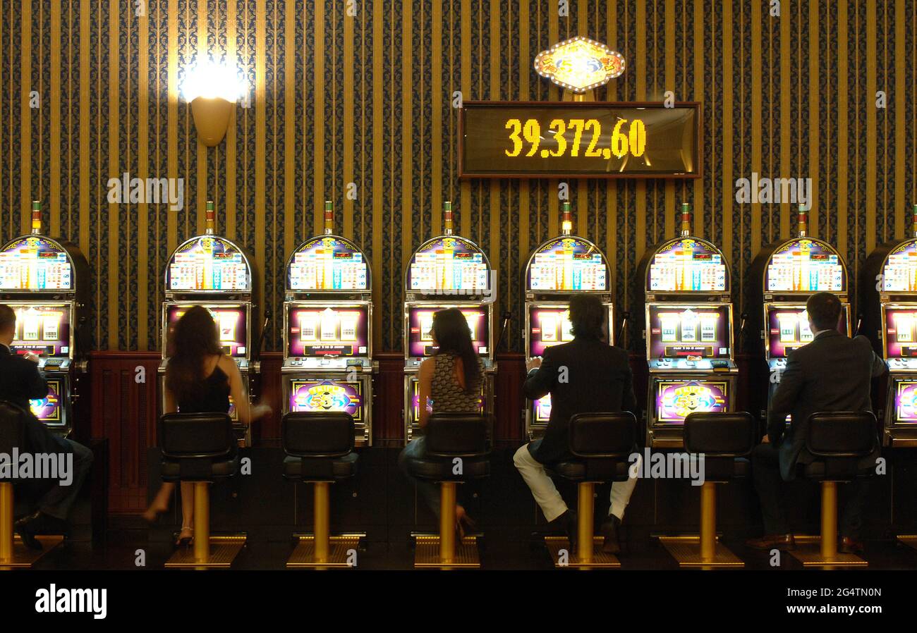 Italy,Sanremo, Casino Municipale Sanremo, people playing the slot ...