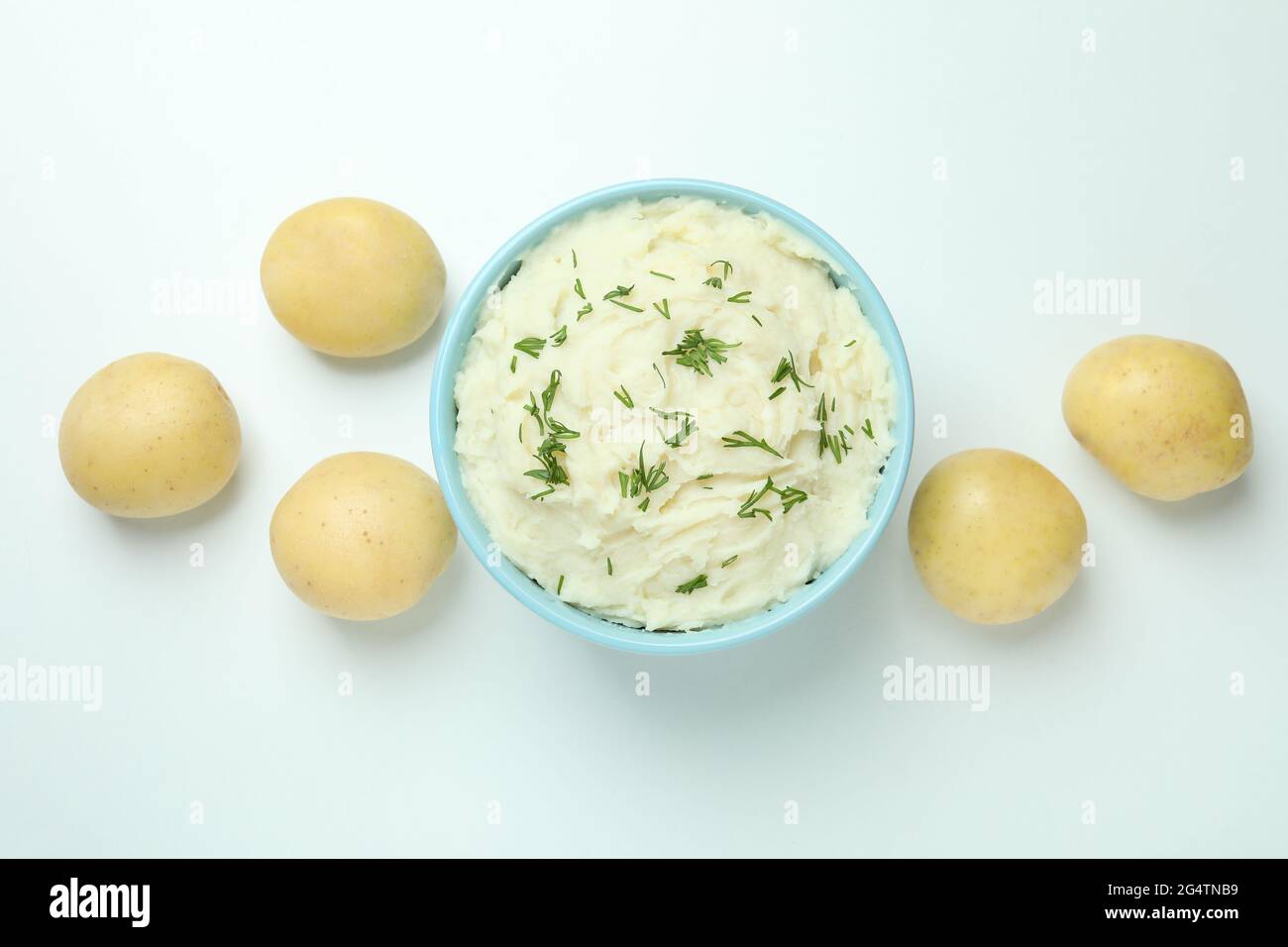 Plate of mashed potatoes and ingredients on white background Stock ...