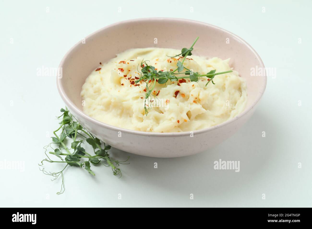 Plate of mashed potatoes on white background Stock Photo - Alamy