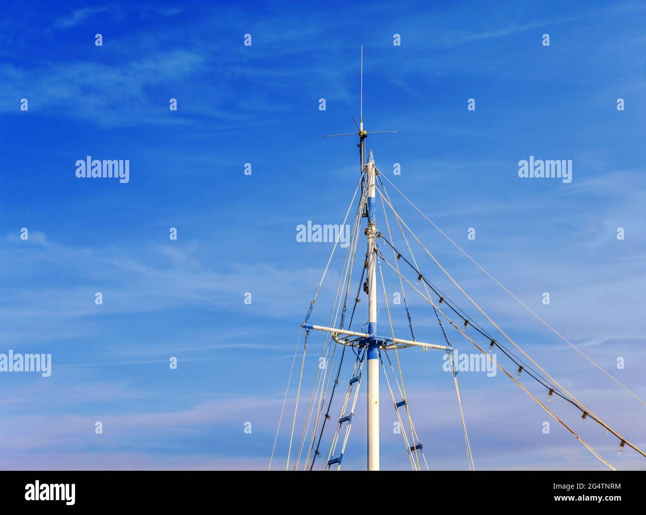 Top of a sailing ship with cloudy sky Stock Photo - Alamy