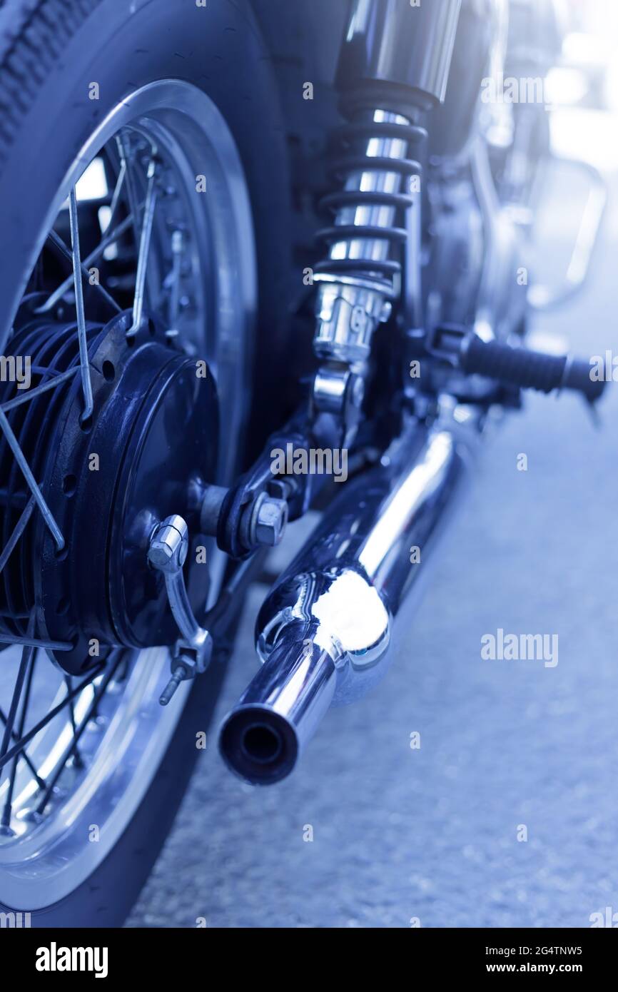 shiny chrome exhaust pipe and retro motorcycle rear Motorcycle Stock ...