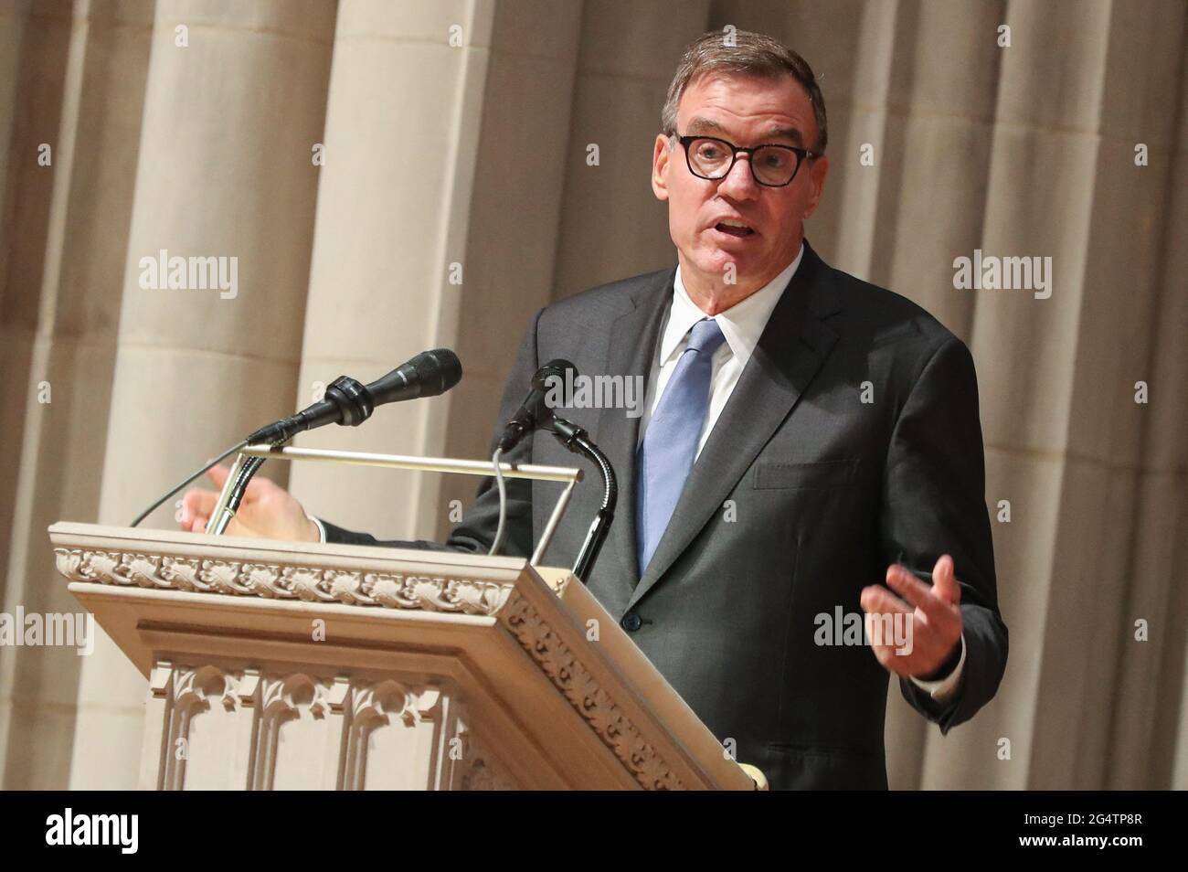 The Honorable Mark R. Warner, Senator (D-VA) speaks during the funeral ...