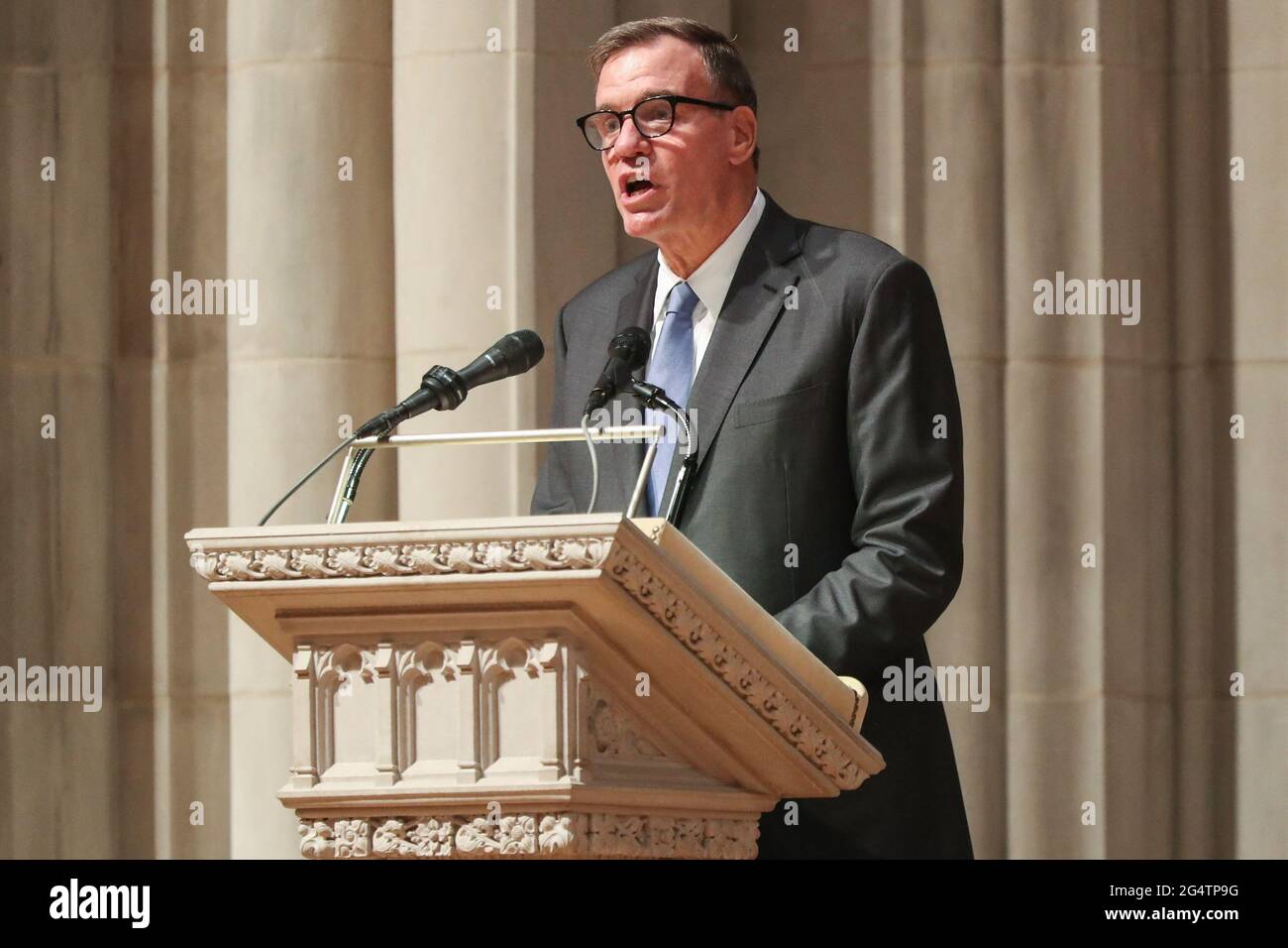 The Honorable Mark R. Warner, Senator (D-VA) speaks during the funeral ...