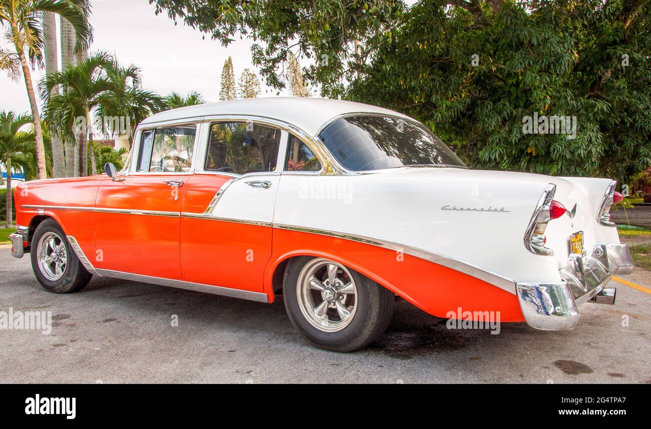 Cuba images:Red-orange vintage Chevrolet car with white and chrome trim ...