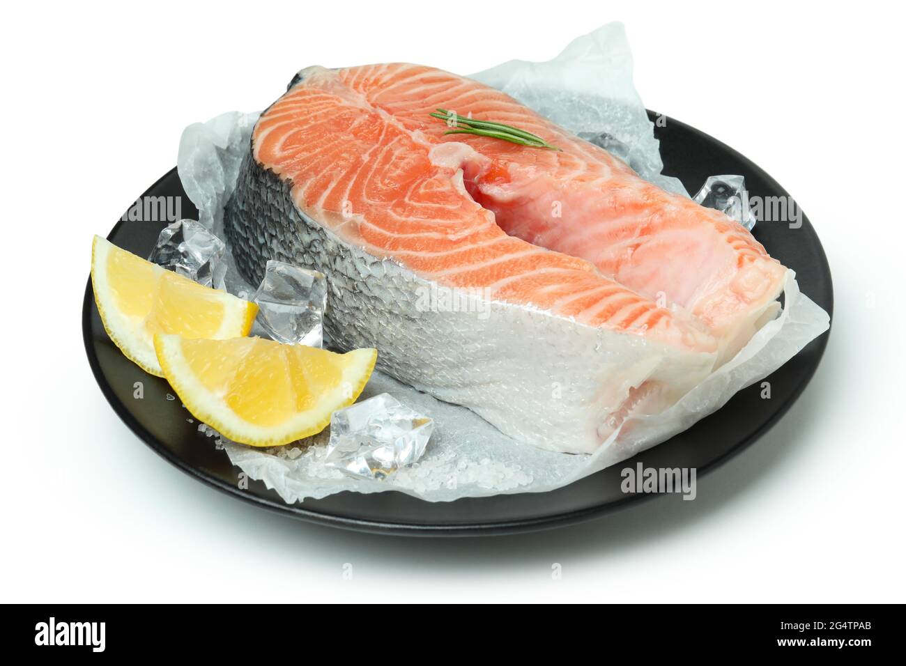 Plate with fresh raw salmon isolated on white background Stock Photo ...