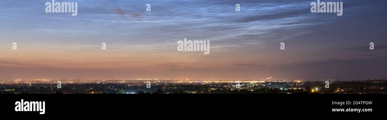 Panoramic view of very rare noctilucent clouds and stars shining ...