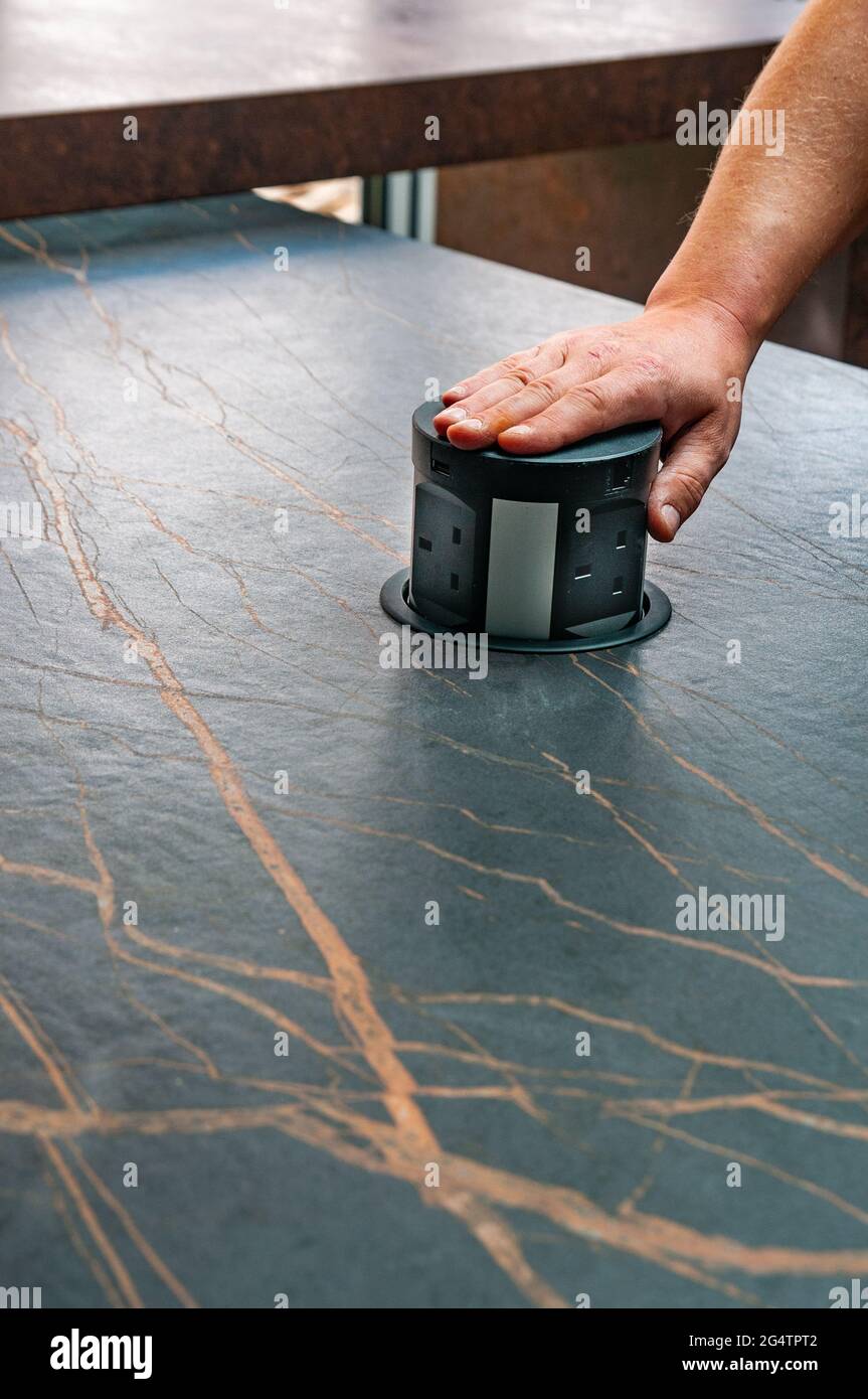 Kitchen fitter at work Stock Photo - Alamy