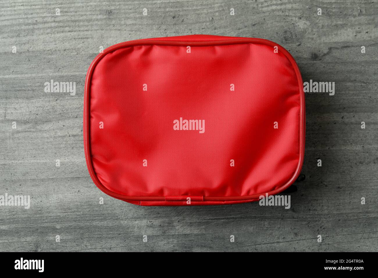 Blank first aid medical kit on gray textured background Stock Photo - Alamy