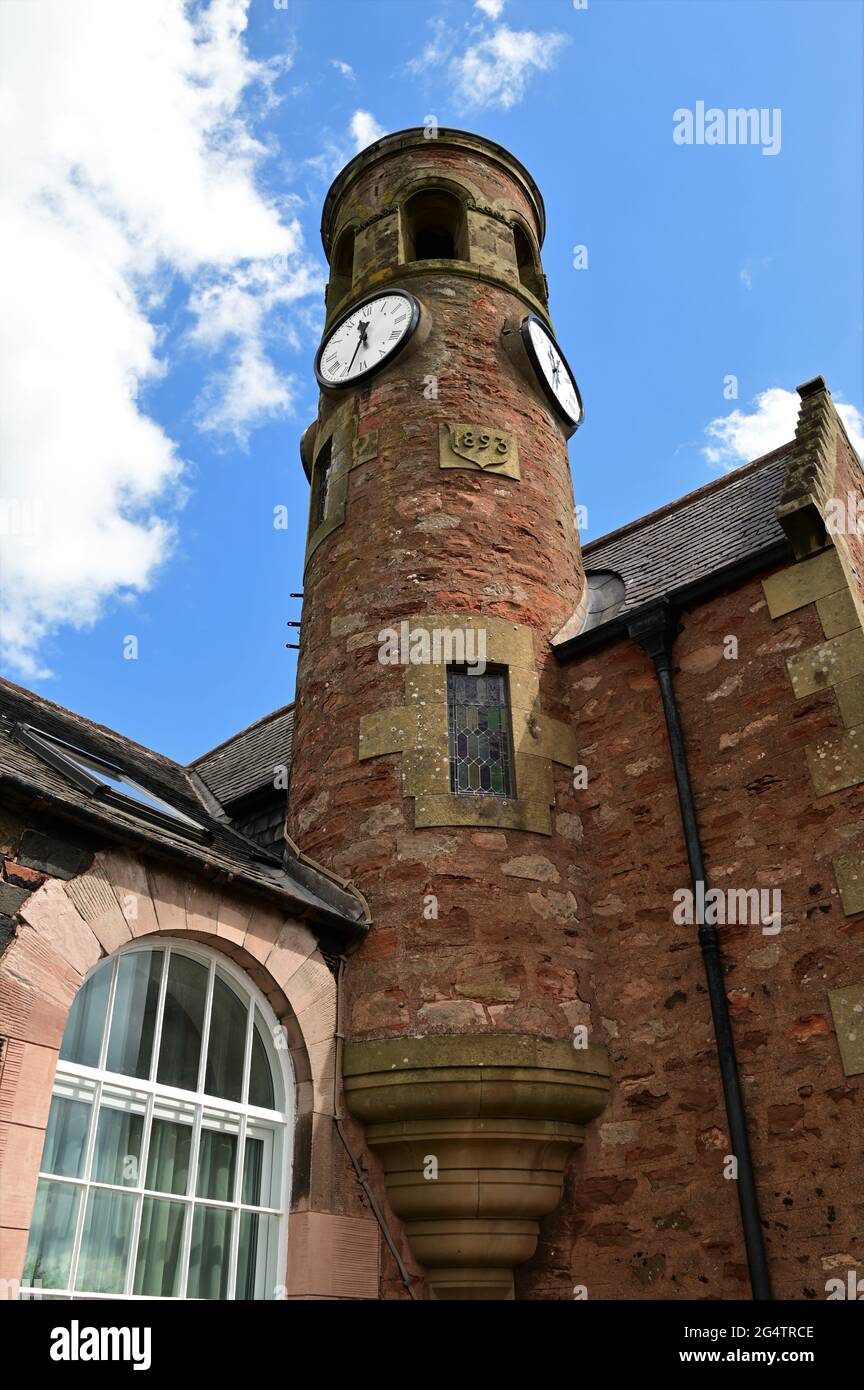An exterior view of an old stone clock tower building in the Scottish ...