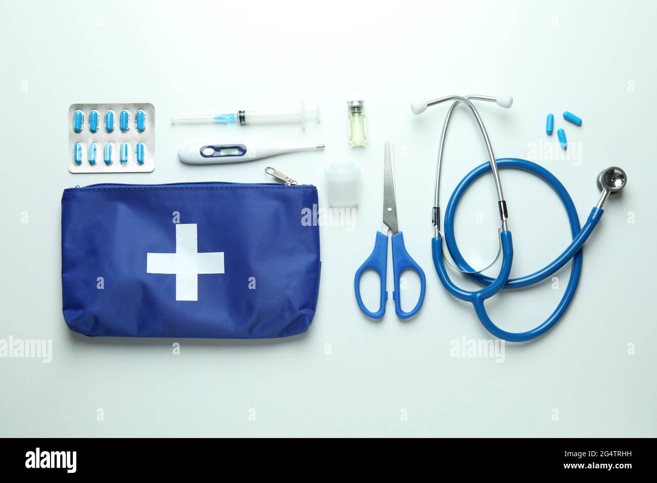 First aid medical kit on white background Stock Photo - Alamy