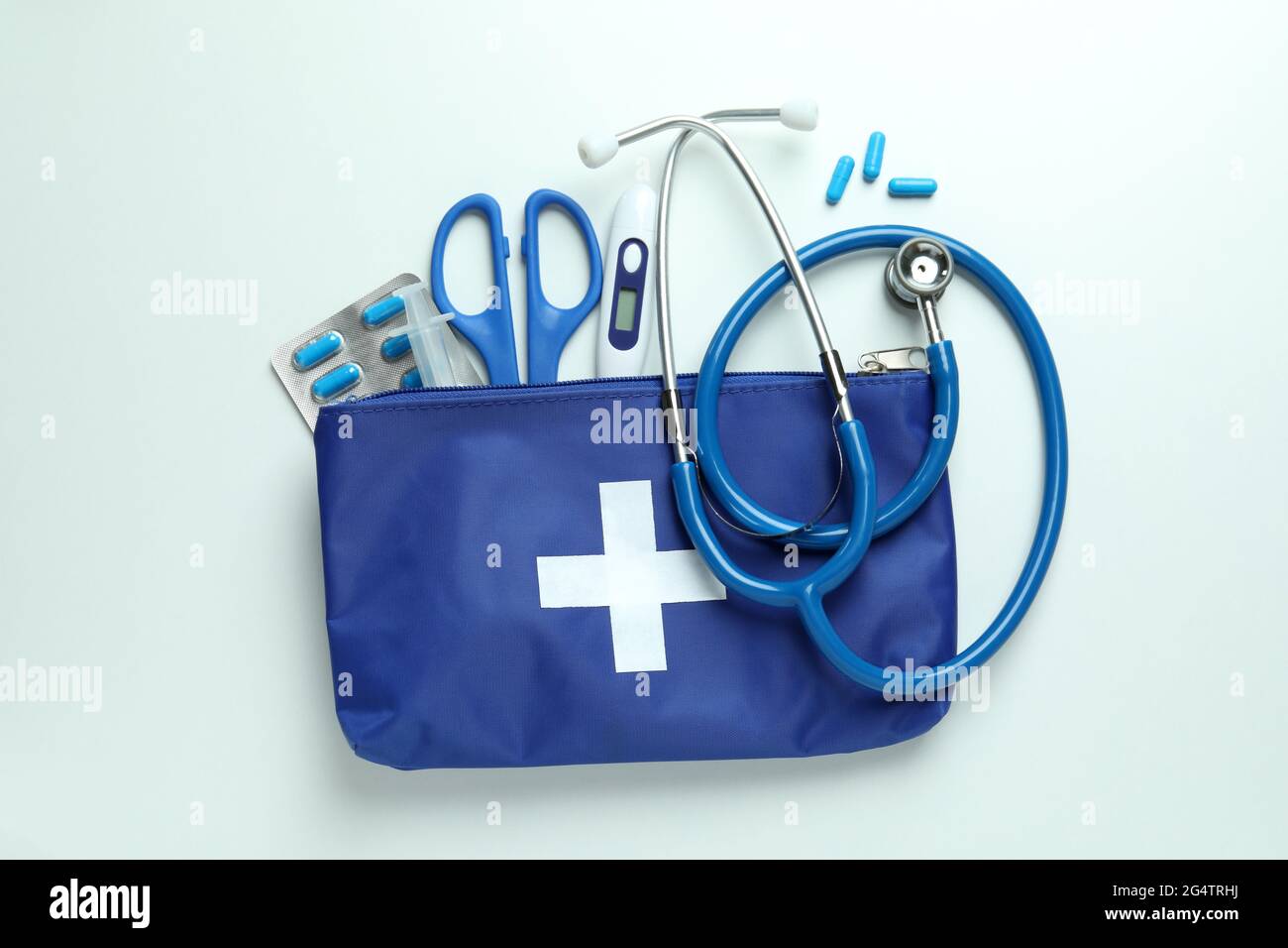 First aid medical kit on white background Stock Photo - Alamy
