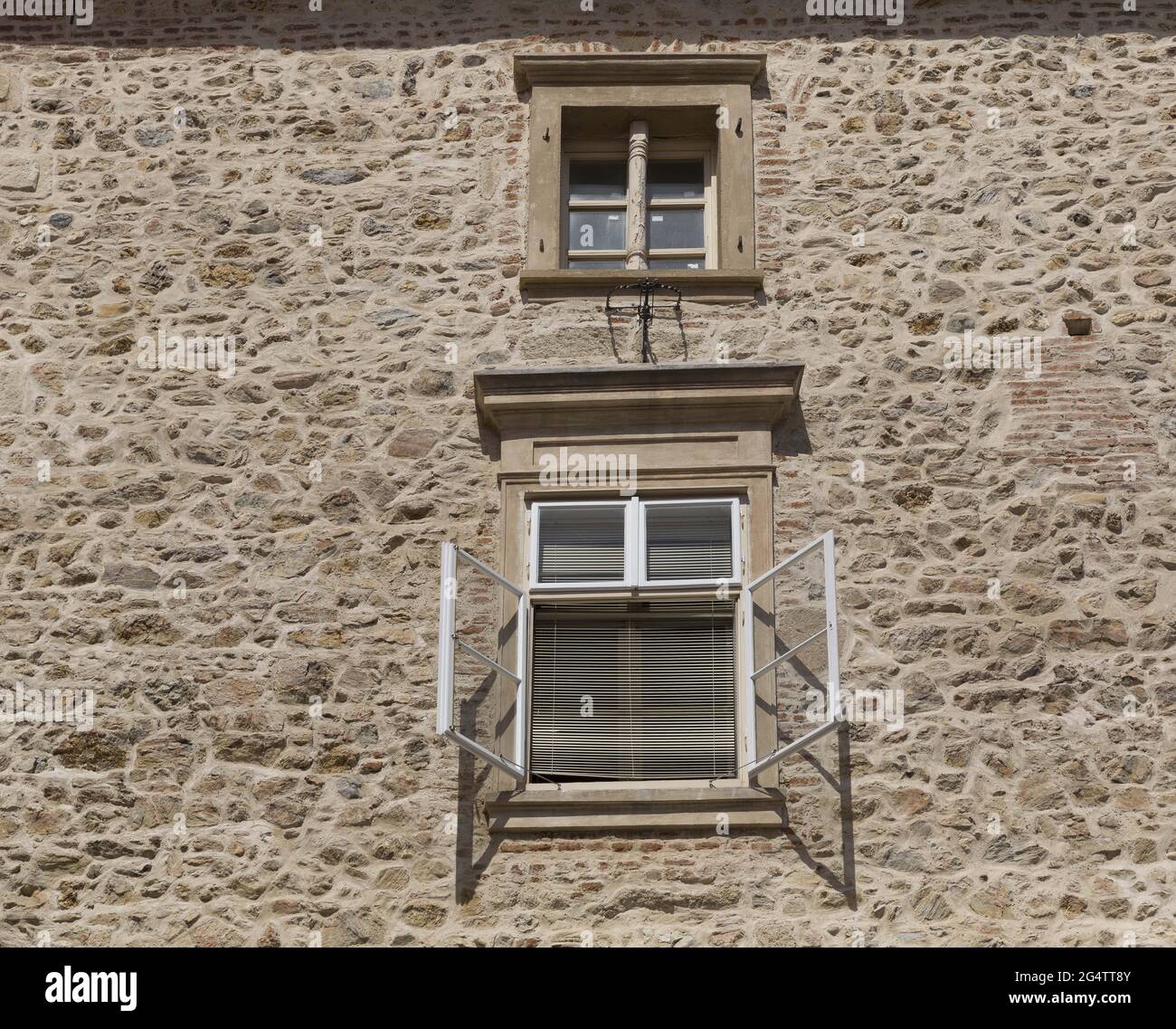 Window on the stone wall Stock Photo - Alamy