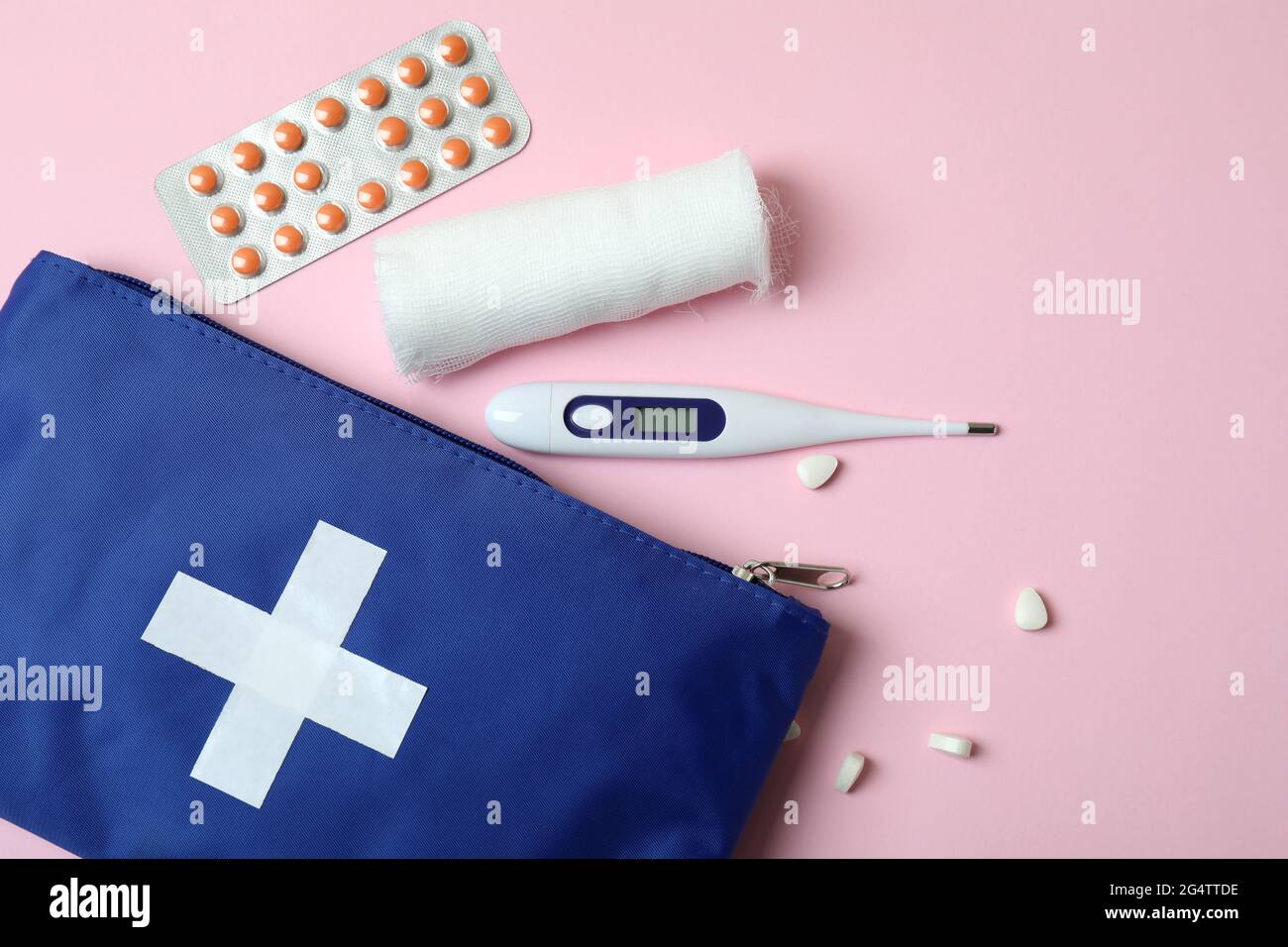 First aid medical kit on pink background Stock Photo - Alamy