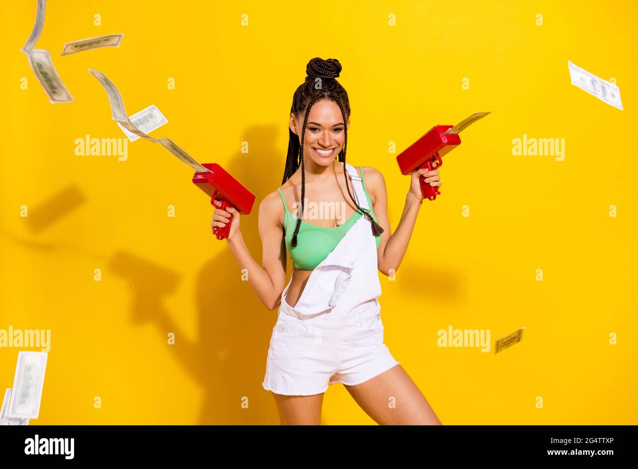 Photo of excited sweet dark skin woman dressed white overall shooting ...