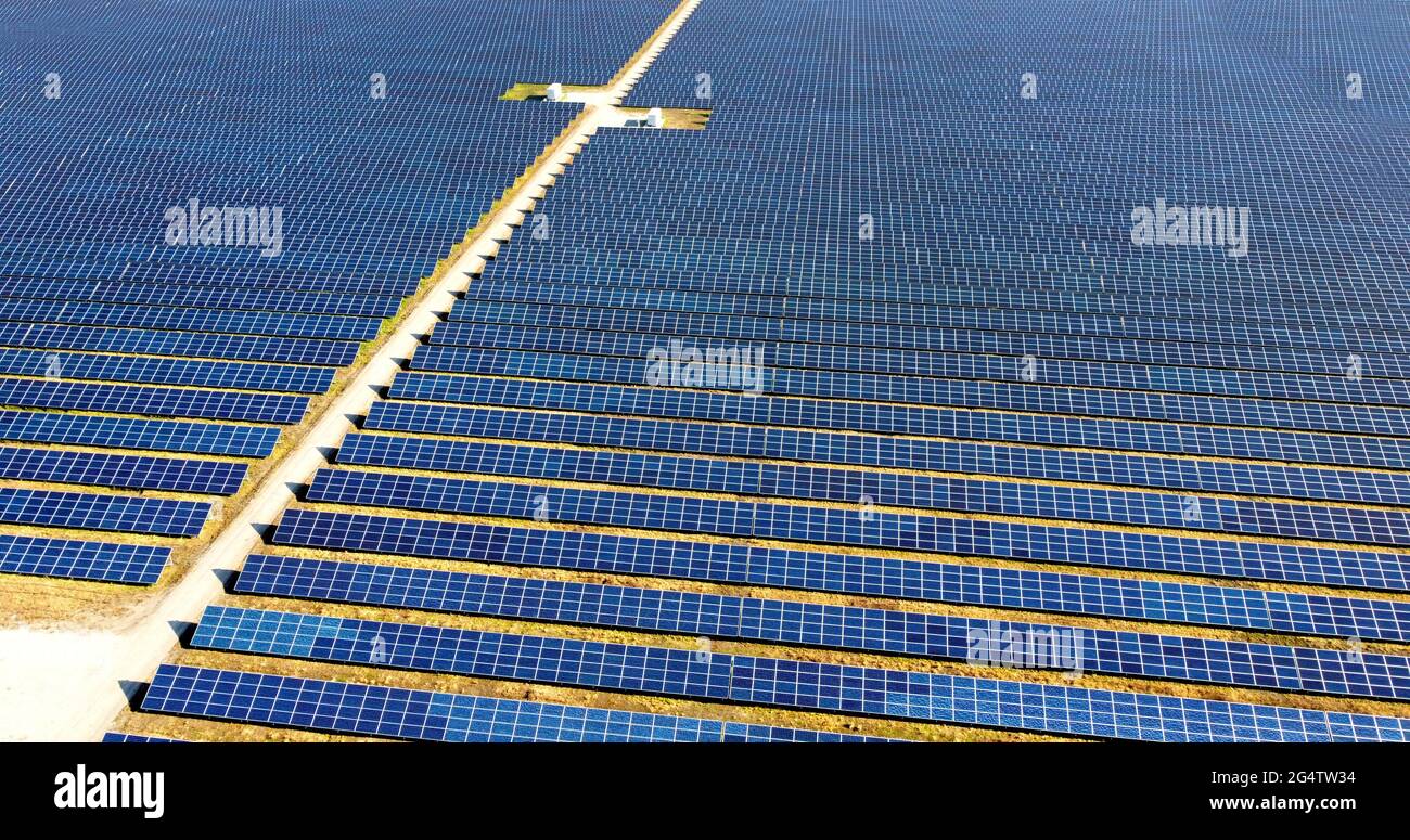 Drone flight over solar panels hi-res stock photography and images - Alamy