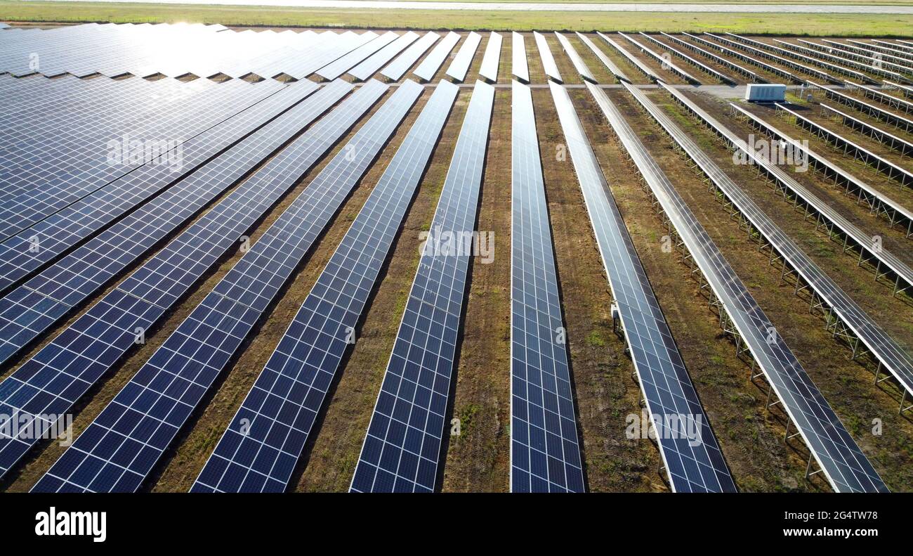 Aerial drone view flight over solar power station panels Stock Photo ...