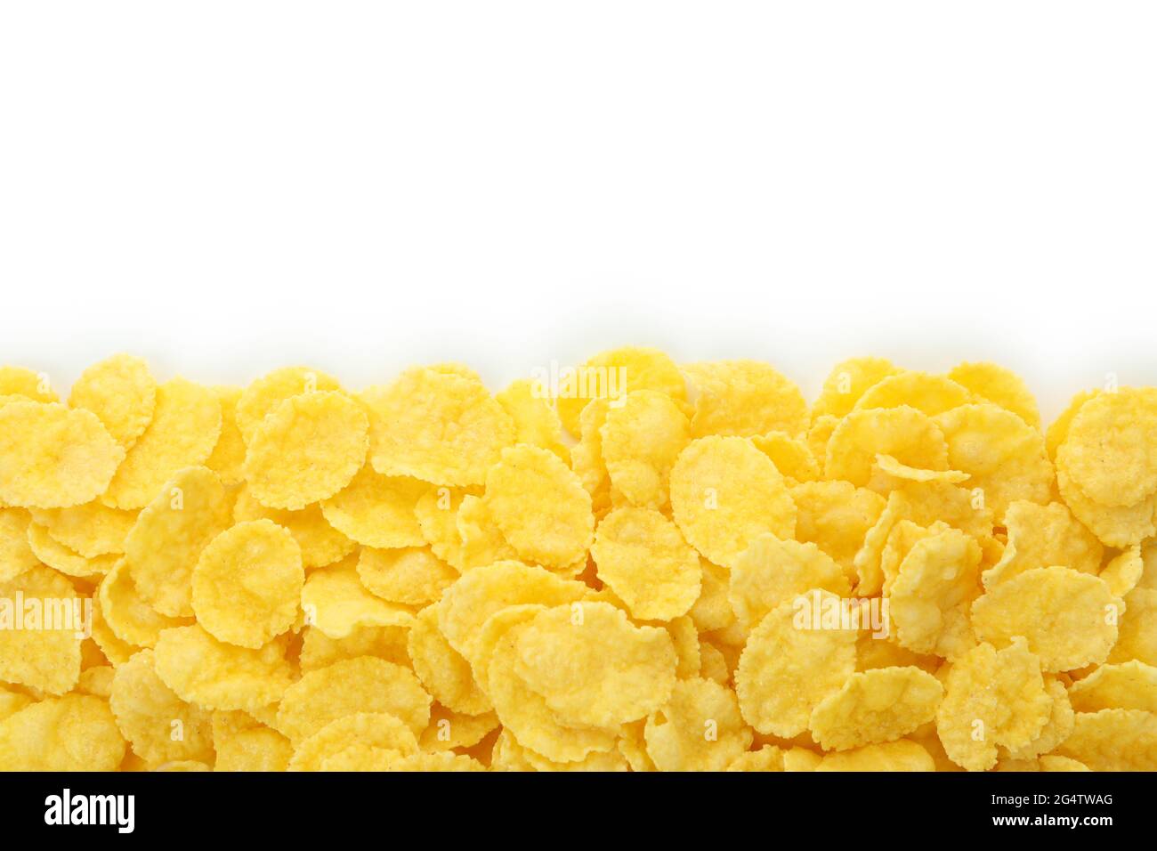 Dry uncooked corn flakes isolated on white background Stock Photo - Alamy