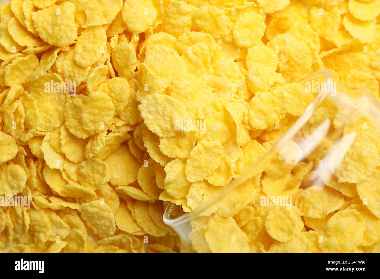 Jar with corn flakes on corn flakes background Stock Photo - Alamy