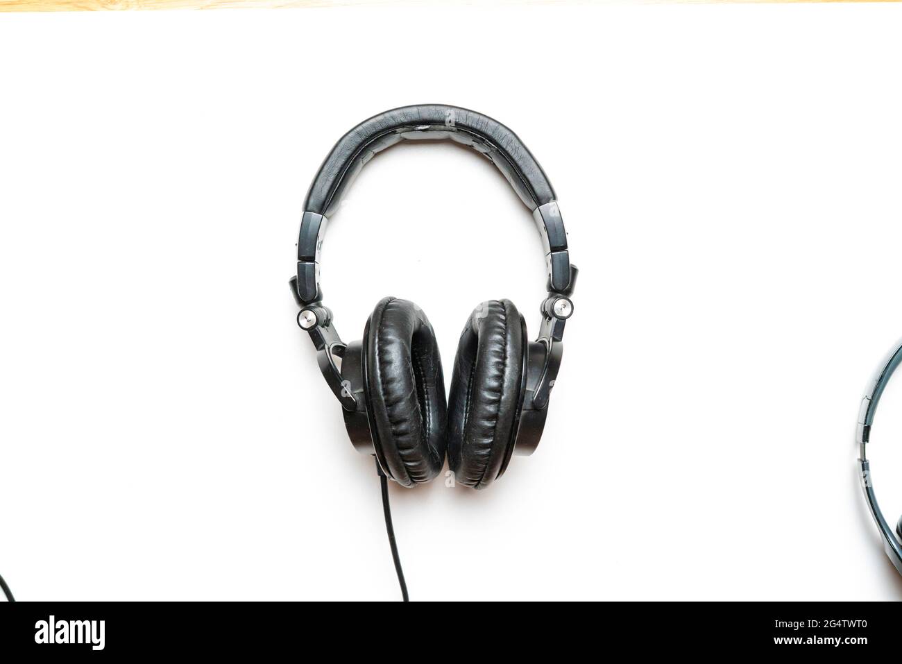 old used headphones isolated on white background Stock Photo - Alamy