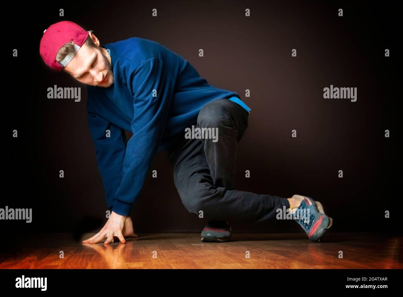 attractive male street dancer perform break dance footwork Stock Photo ...