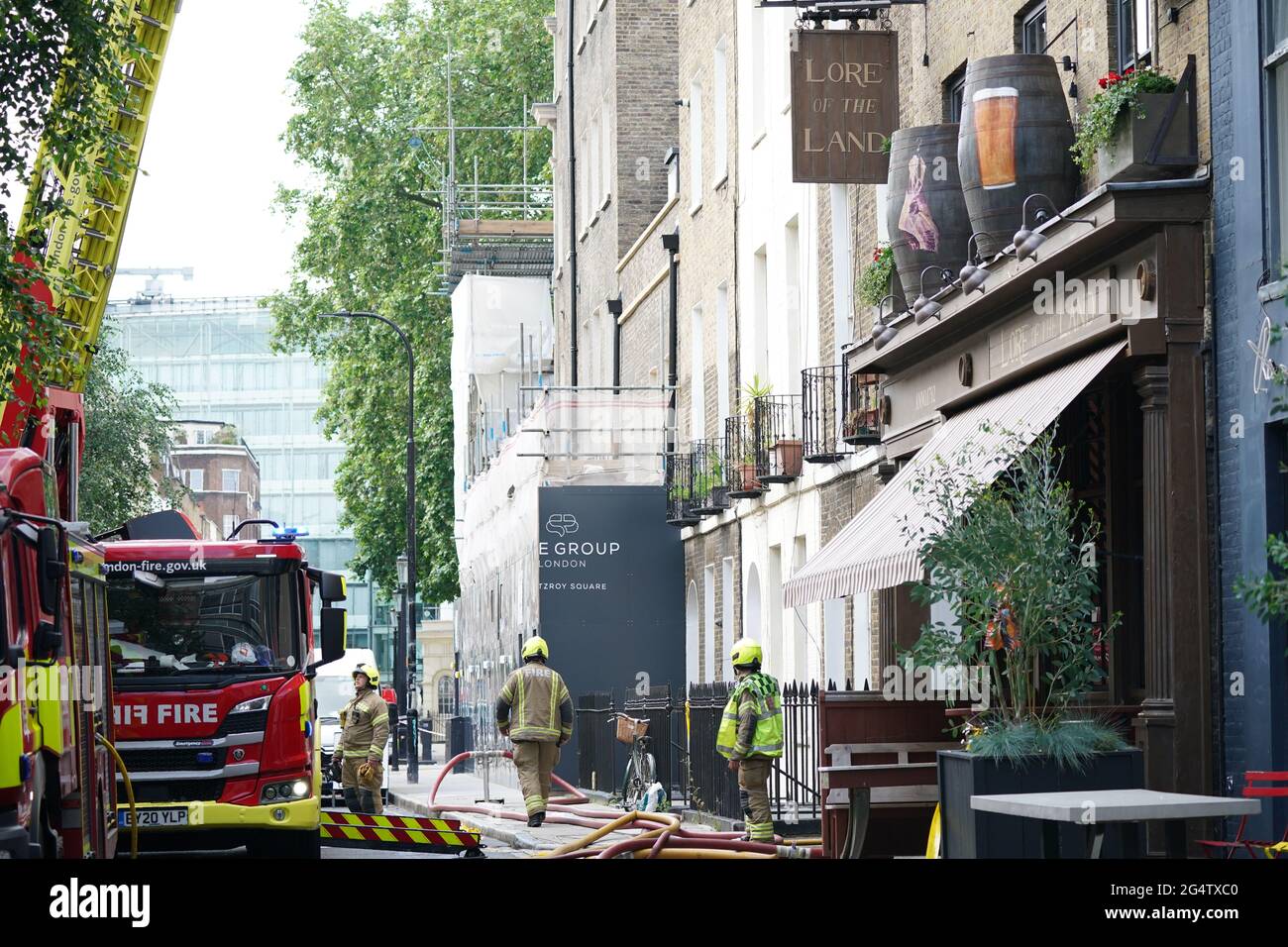 London Fire Brigade (LFB) firefighters at the scene of a fire at the ...