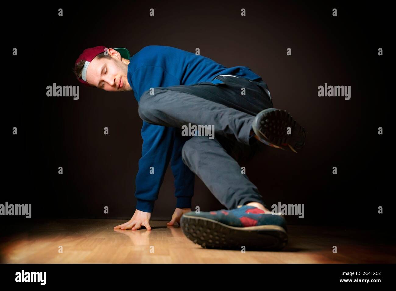attractive male street dancer perform break dance footwork Stock Photo ...