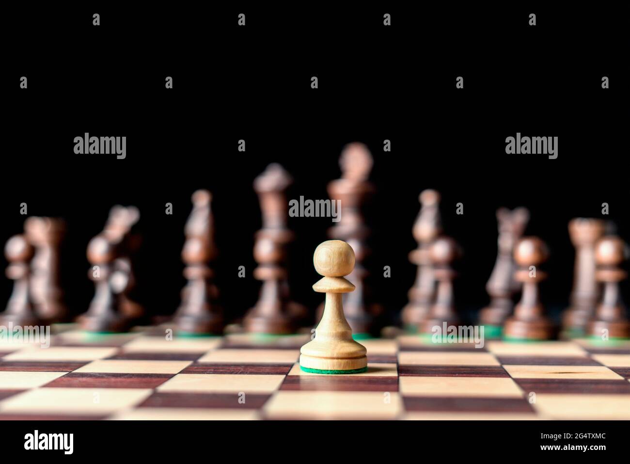 one man army chess concept, first move with pawn Stock Photo - Alamy
