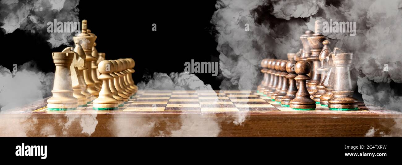 chess board game battle in smoke concept background Stock Photo - Alamy