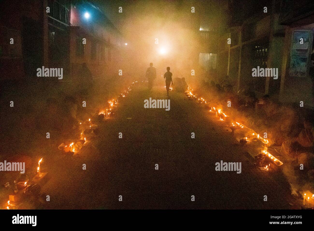 The ritual activity.Thousands of Hindu devotees sits with candle ...