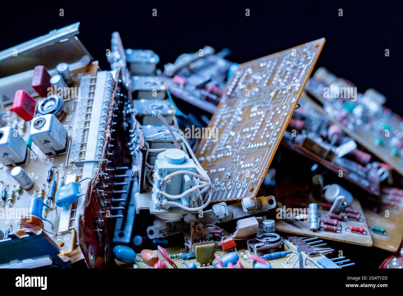 closeup photo of bunch of computer electric detail on dark background ...