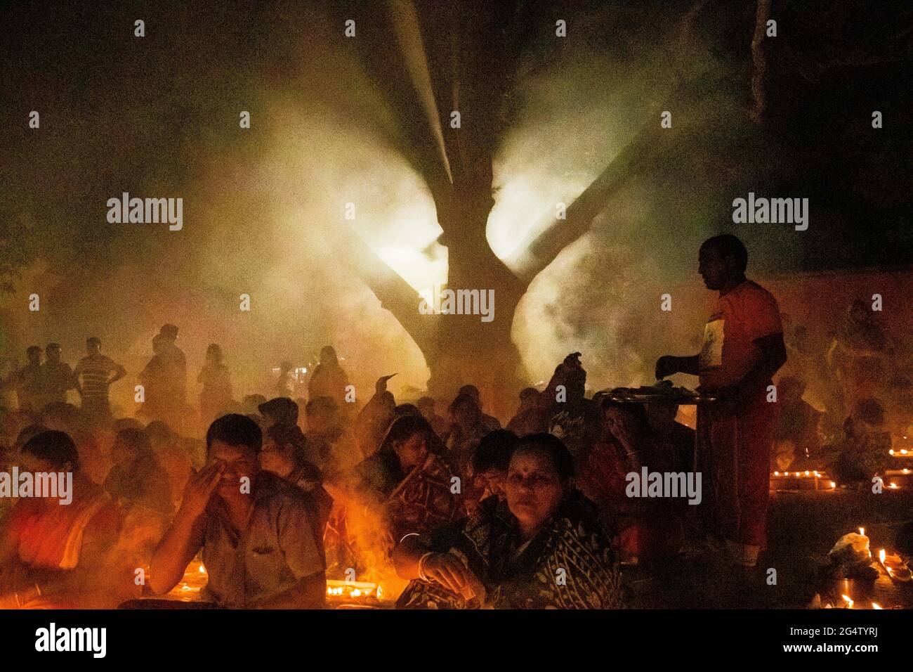 The ritual activity.Thousands of Hindu devotees sits with candle ...