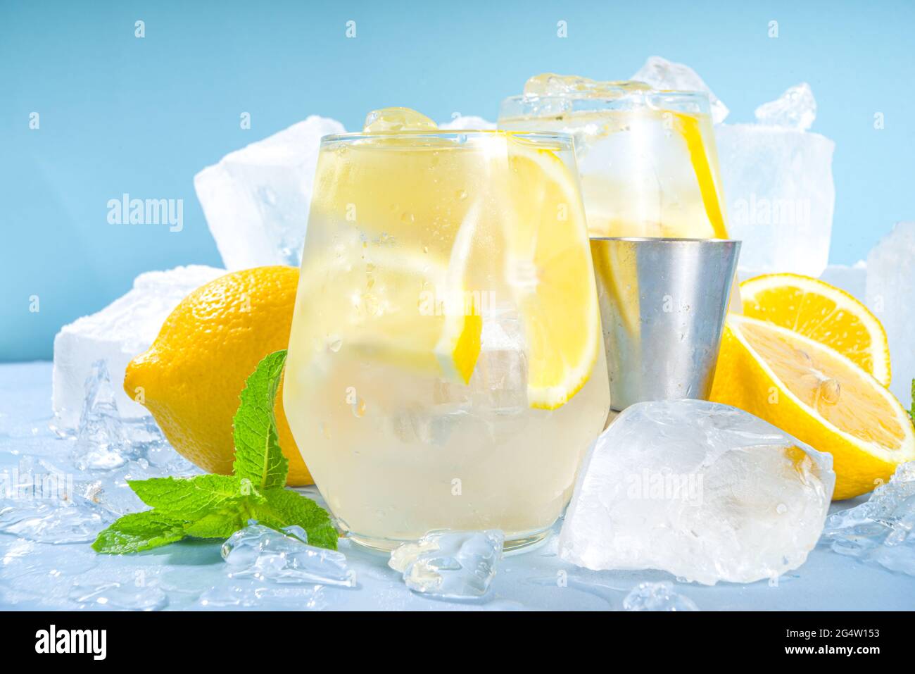 Traditional summer cold refreshing cocktail lemonade, with lemon slices ...