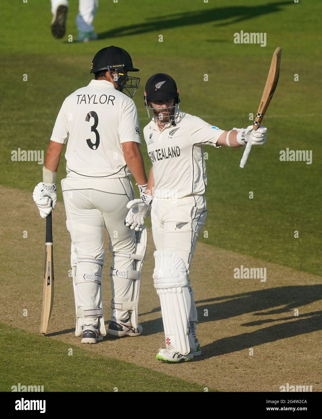 New zealands kane williamson raises hi-res stock photography and images ...