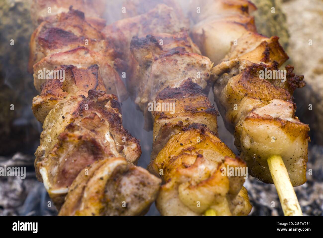 High angle shot of Georgian traditional dish Mtsvadi on the fire Stock ...