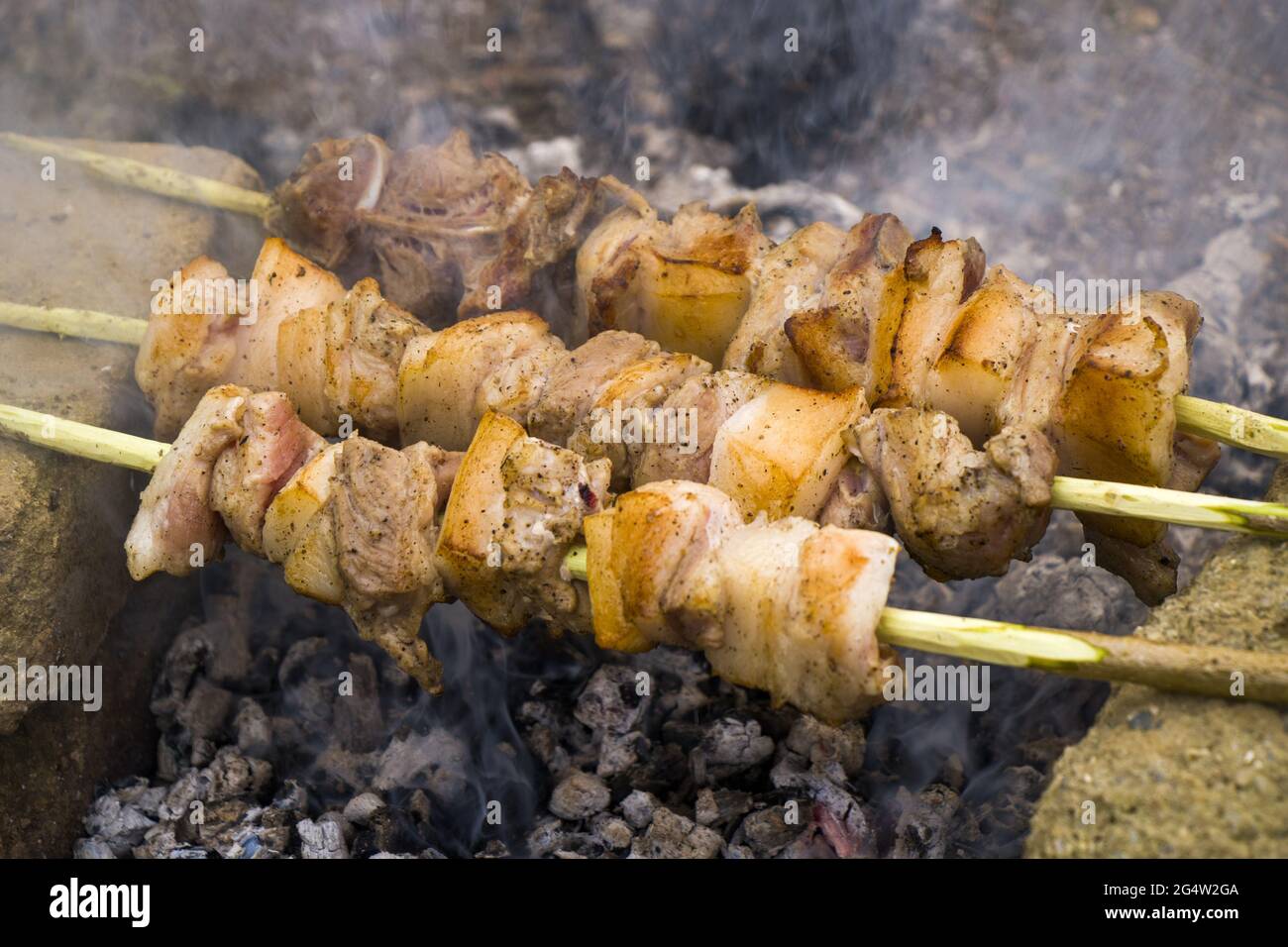 High angle shot of Georgian traditional dish Mtsvadi on the fire Stock ...
