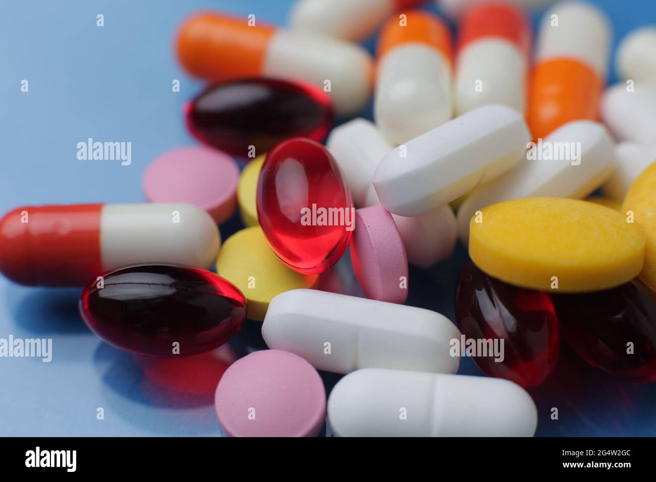 Colorful of tablets and capsules pill in blister packaging arranged ...