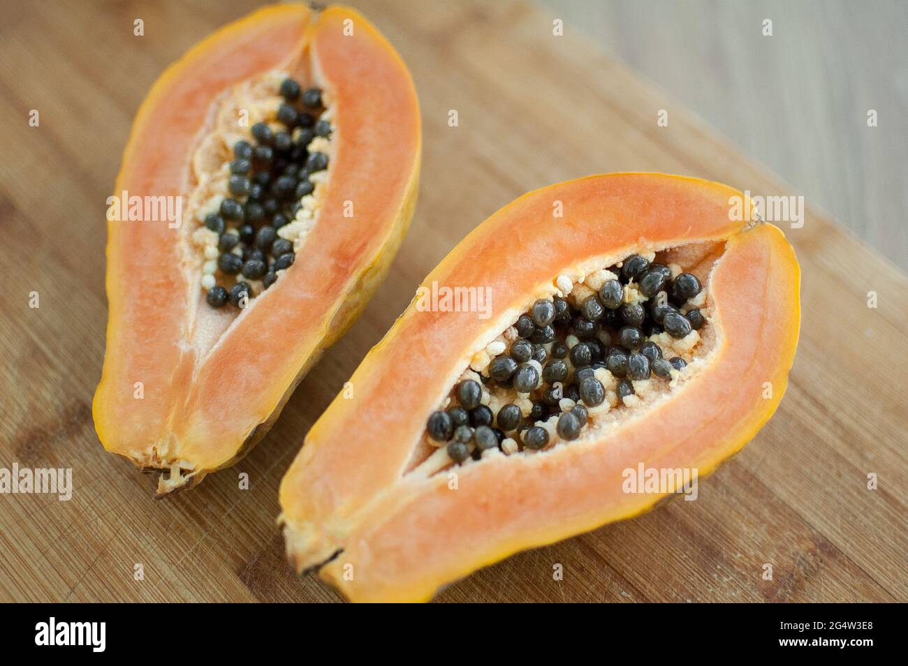 Papaw fruits with leaves hi-res stock photography and images - Alamy