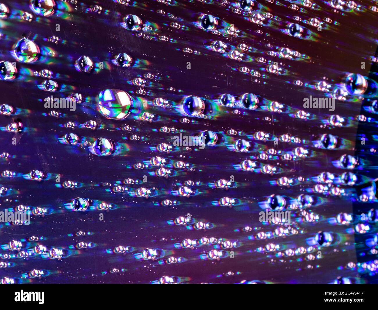 Colourful water drops hi-res stock photography and images - Alamy