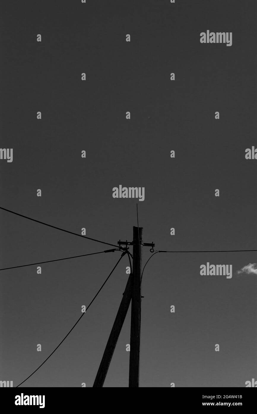 Wooden electricity pole Black and White Stock Photos & Images - Alamy