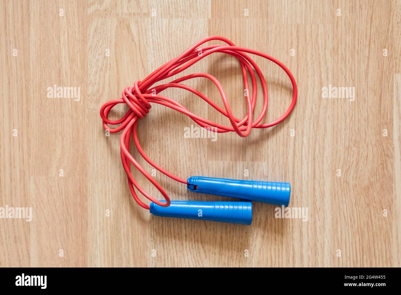 red and blue tied jumping rope isolated Stock Photo - Alamy