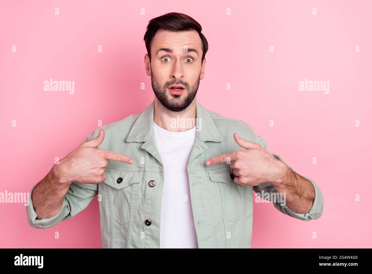 Portrait of nice attractive amazed brunet guy pointing at himself me ...