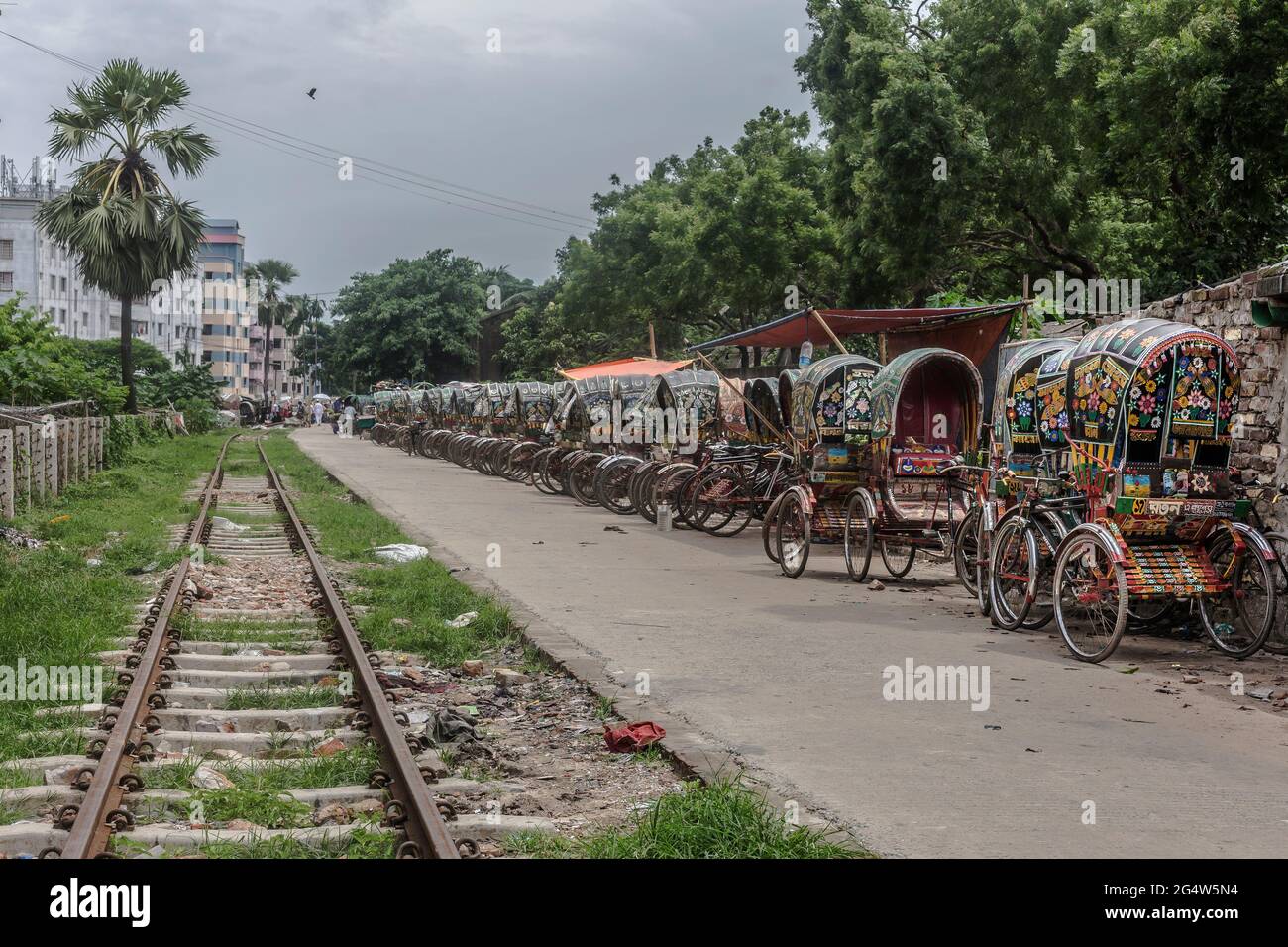 A daily life style of people living along the rail lines in Chittagong ...