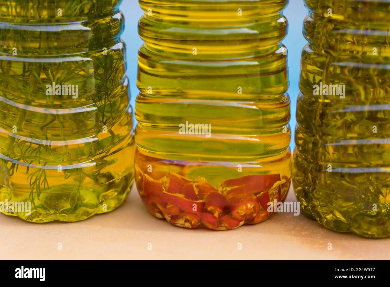 selection of aromatic olive oils enriched with spicy chili and ...