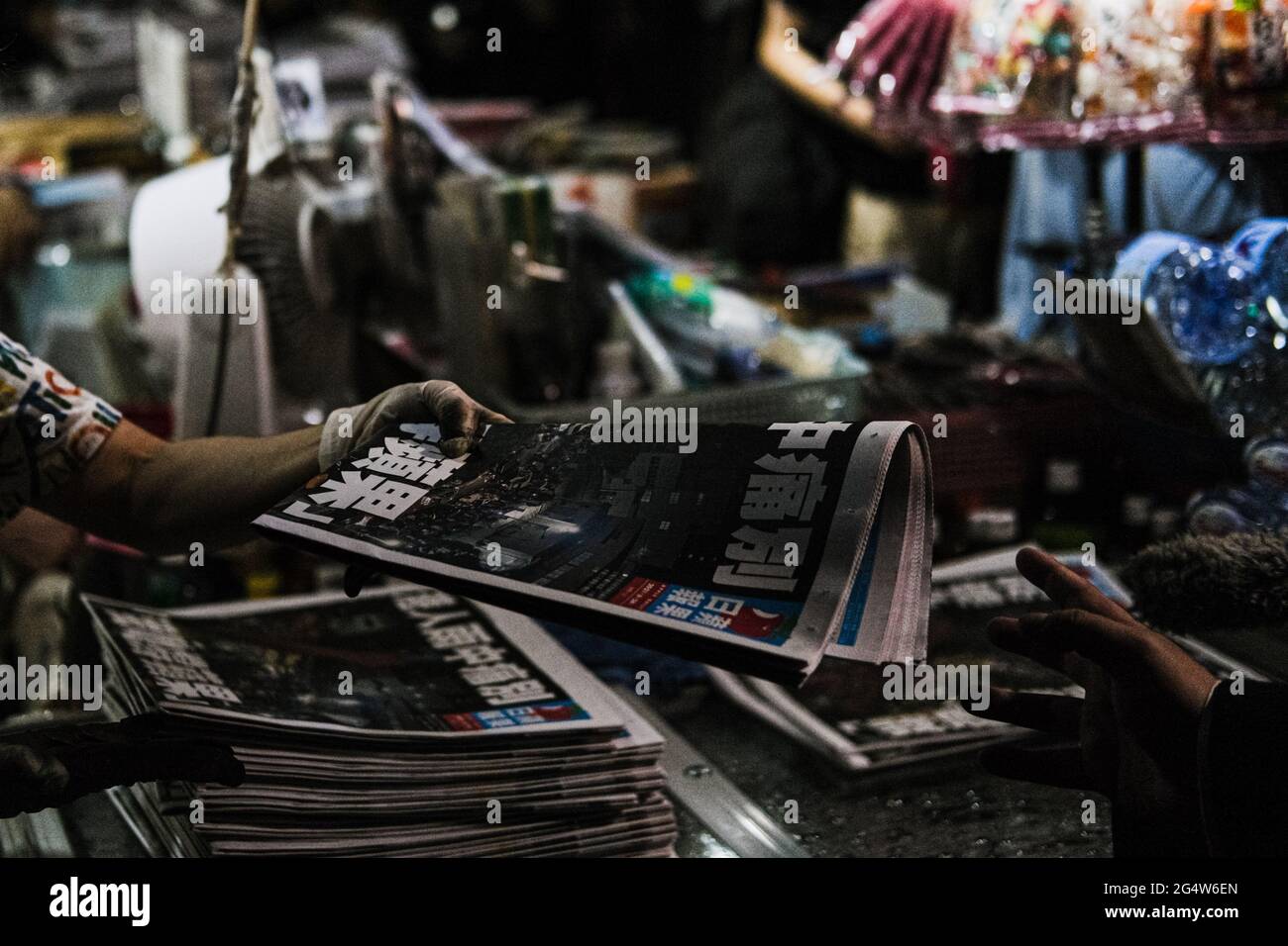 Hong kong tabloid style newspaper hi-res stock photography and images ...