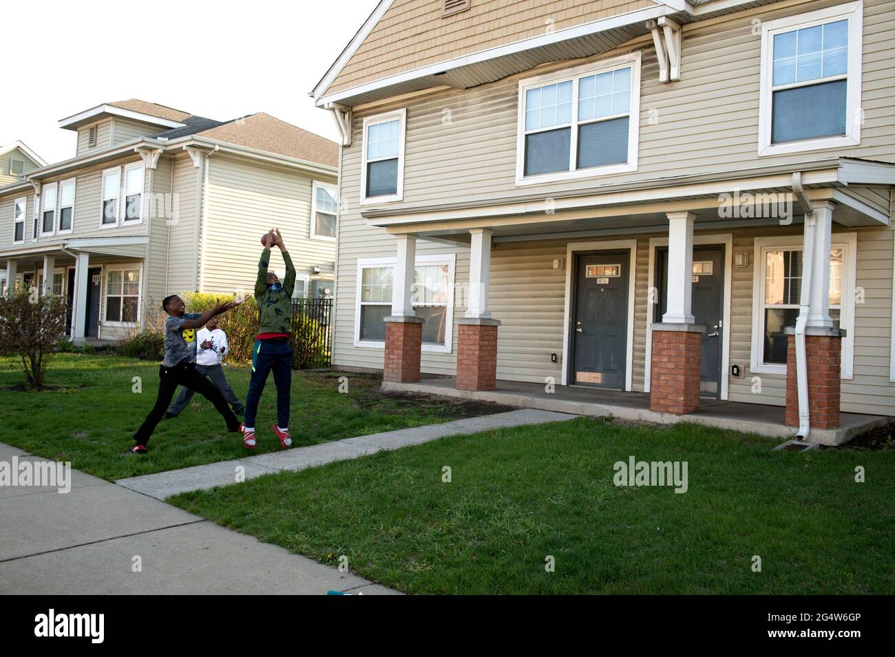 Gary, Indiana, USA. 29th Apr, 2021. Children play outside new homes on ...
