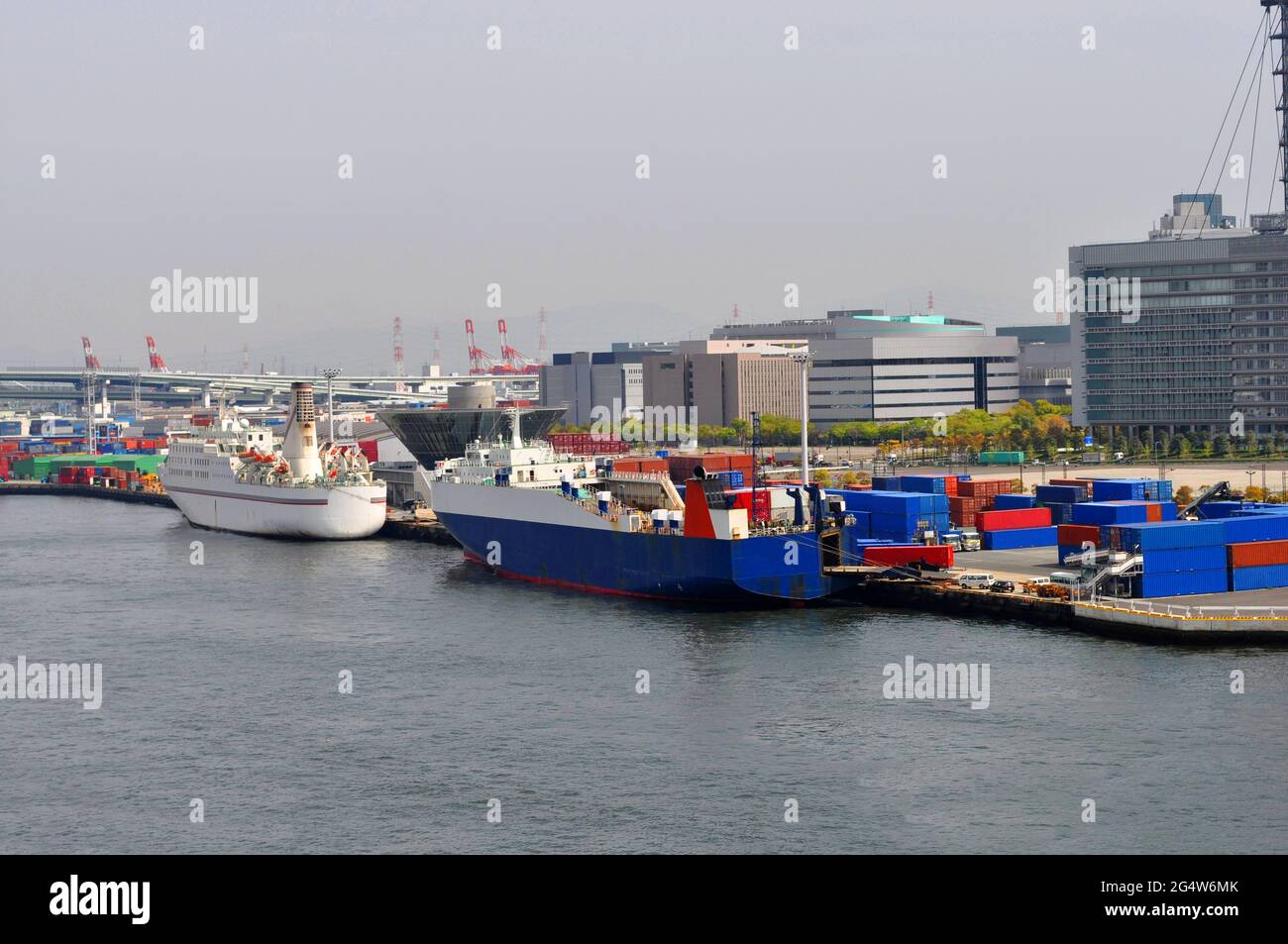RORO ship in port at the container terminal on loading, unloading Stock ...