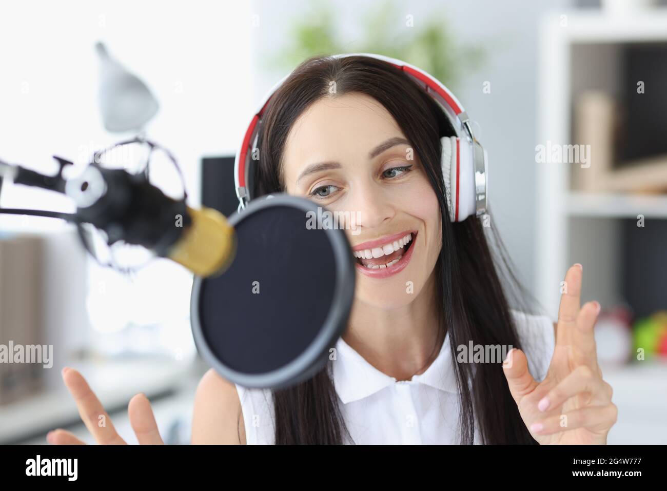 Woman recording podcast hi-res stock photography and images - Alamy