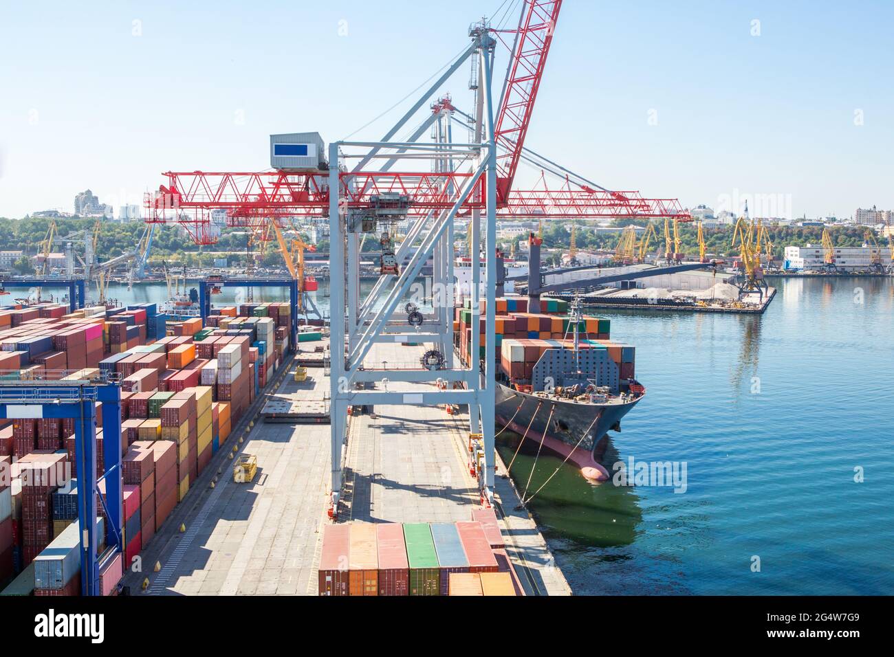 Container ship in port at container terminal. Ships of container ships ...